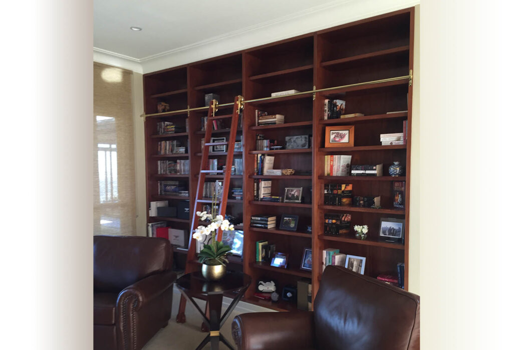 Rich mahogany stained bookcase including library ladder with classy ...